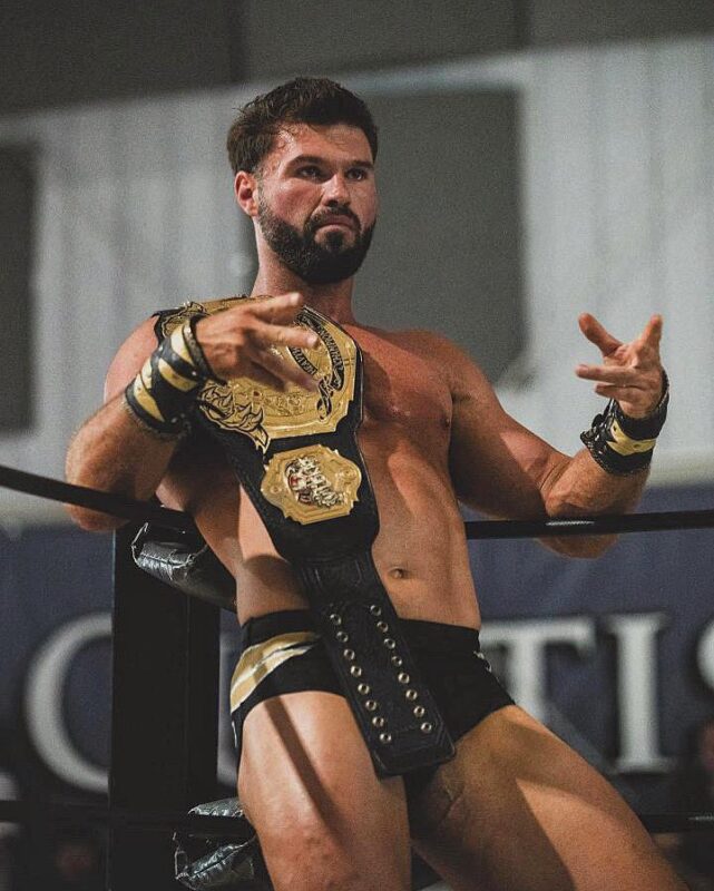 Brady Pierce a Wildkat in ring, on screen - Slam Wrestling